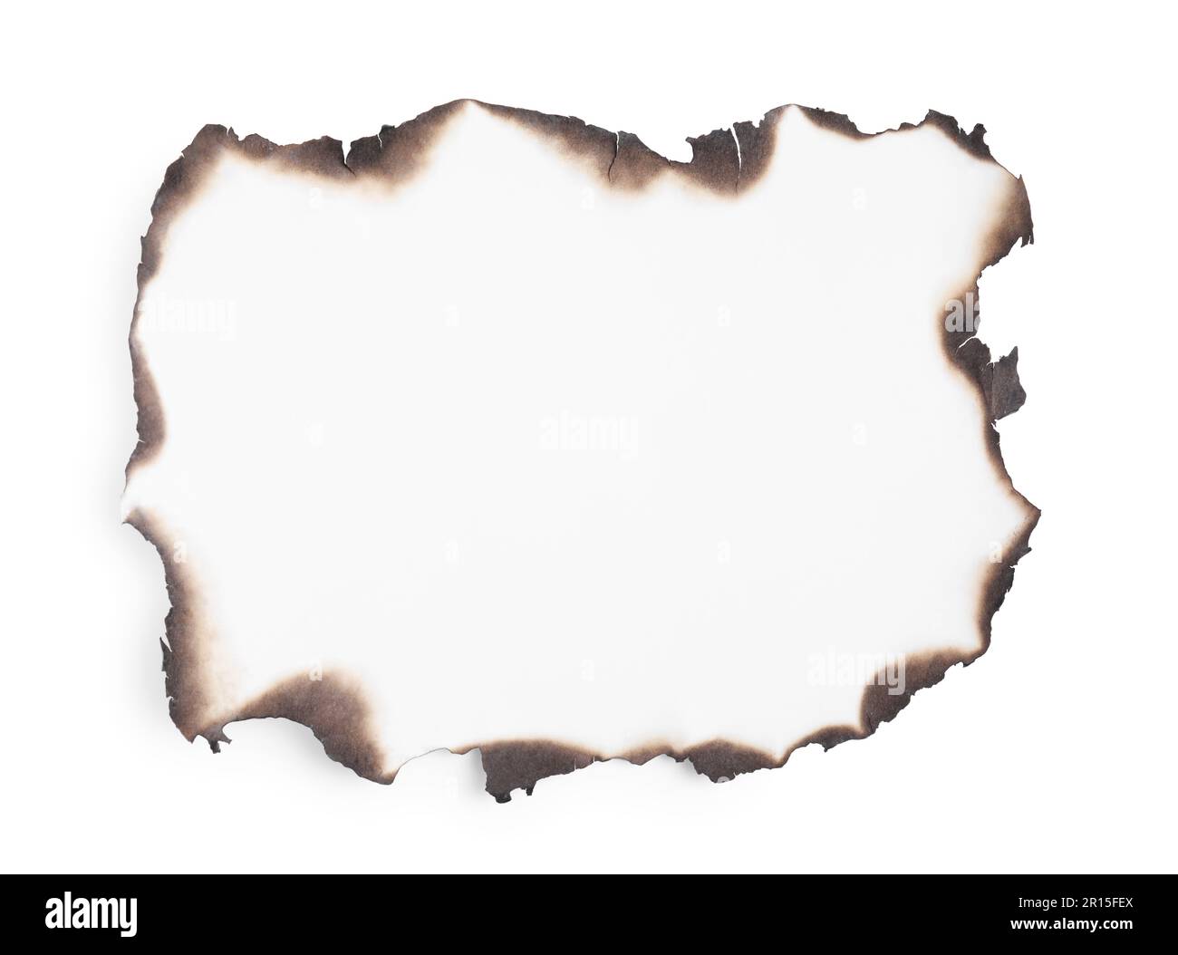 Piece of paper with dark burnt borders on white background, top view ...