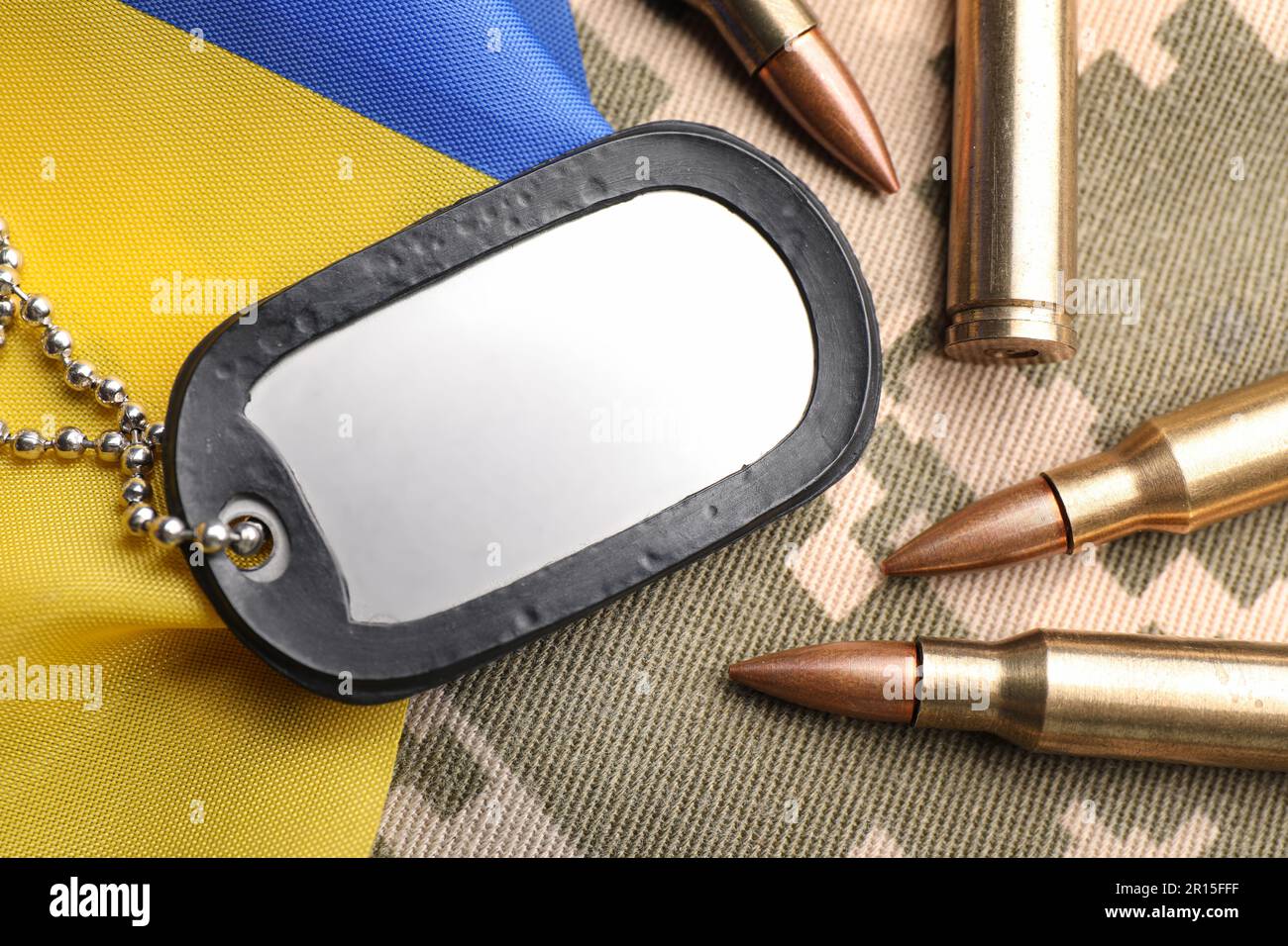 Military ID tag, bullets and Ukrainian flag on pixel camouflage, flat ...