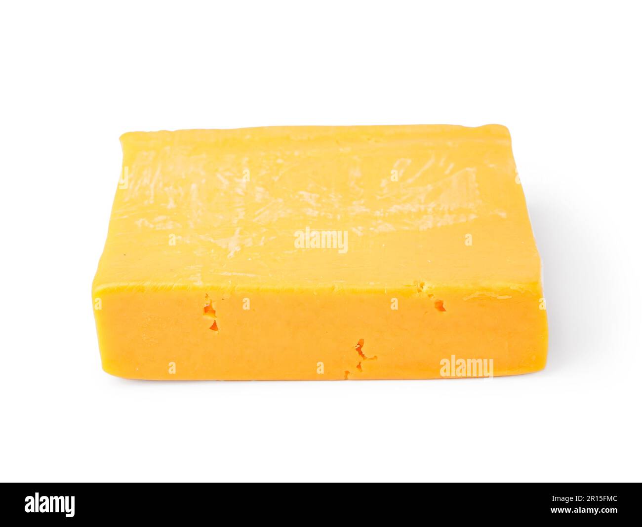 Piece of tasty cheddar cheese on white background Stock Photo - Alamy