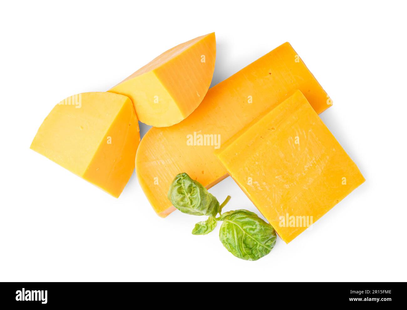 Pieces of tasty cheddar cheese on white background Stock Photo - Alamy
