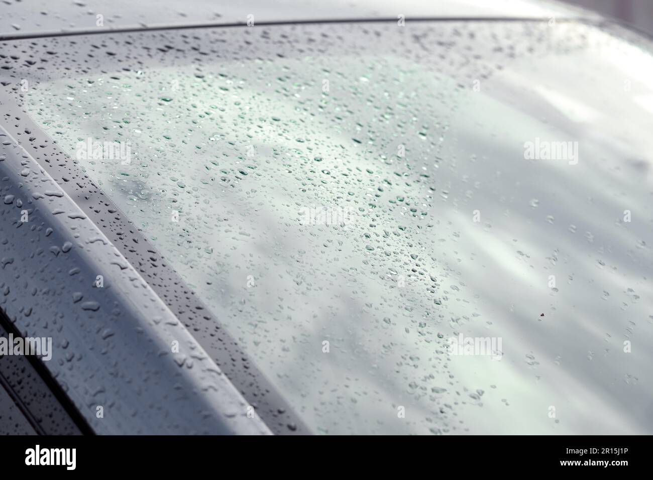 Raindrop on glass front car hi-res stock photography and images - Alamy