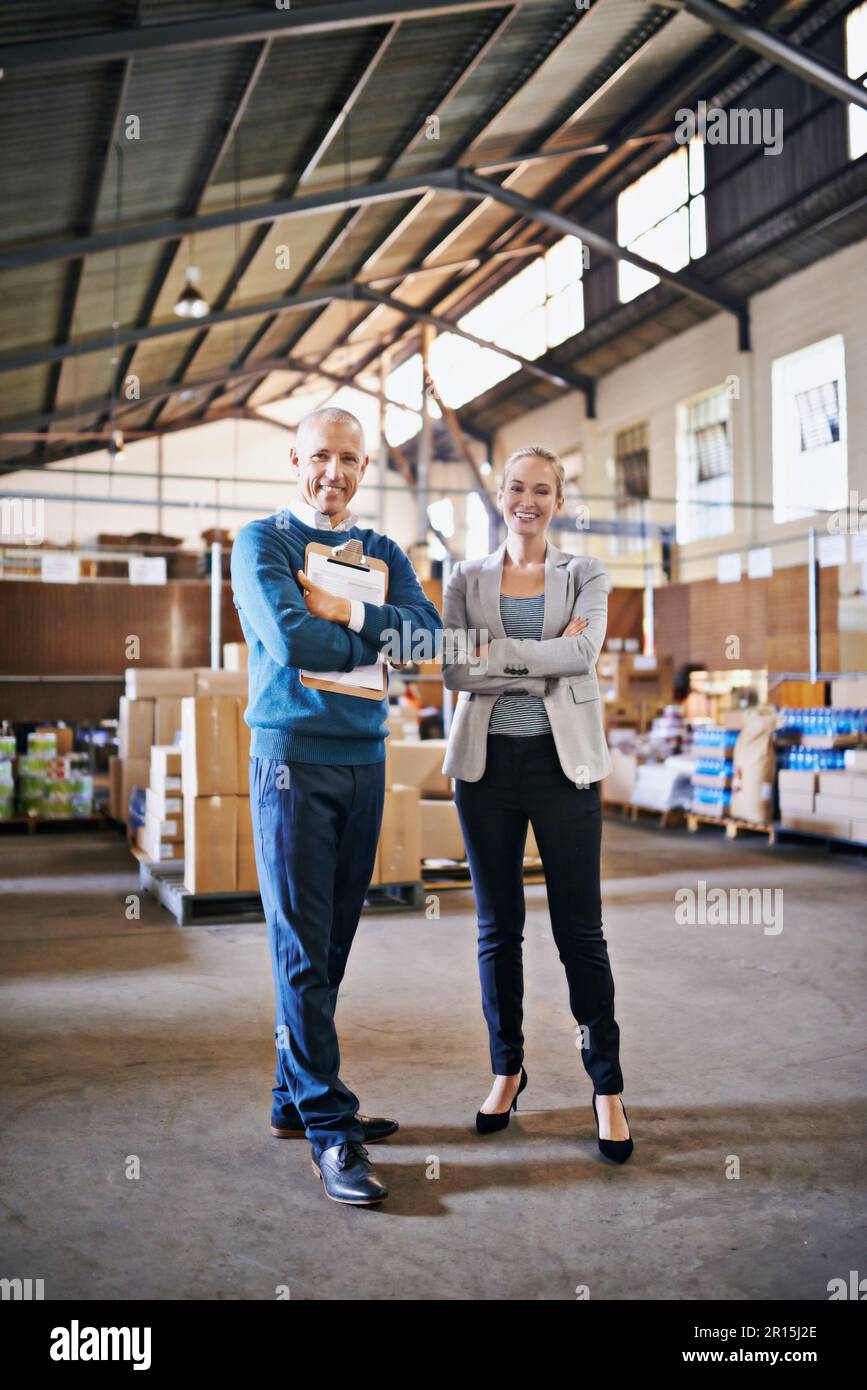 We make international shipping logistics look easy. Portrait of two ...