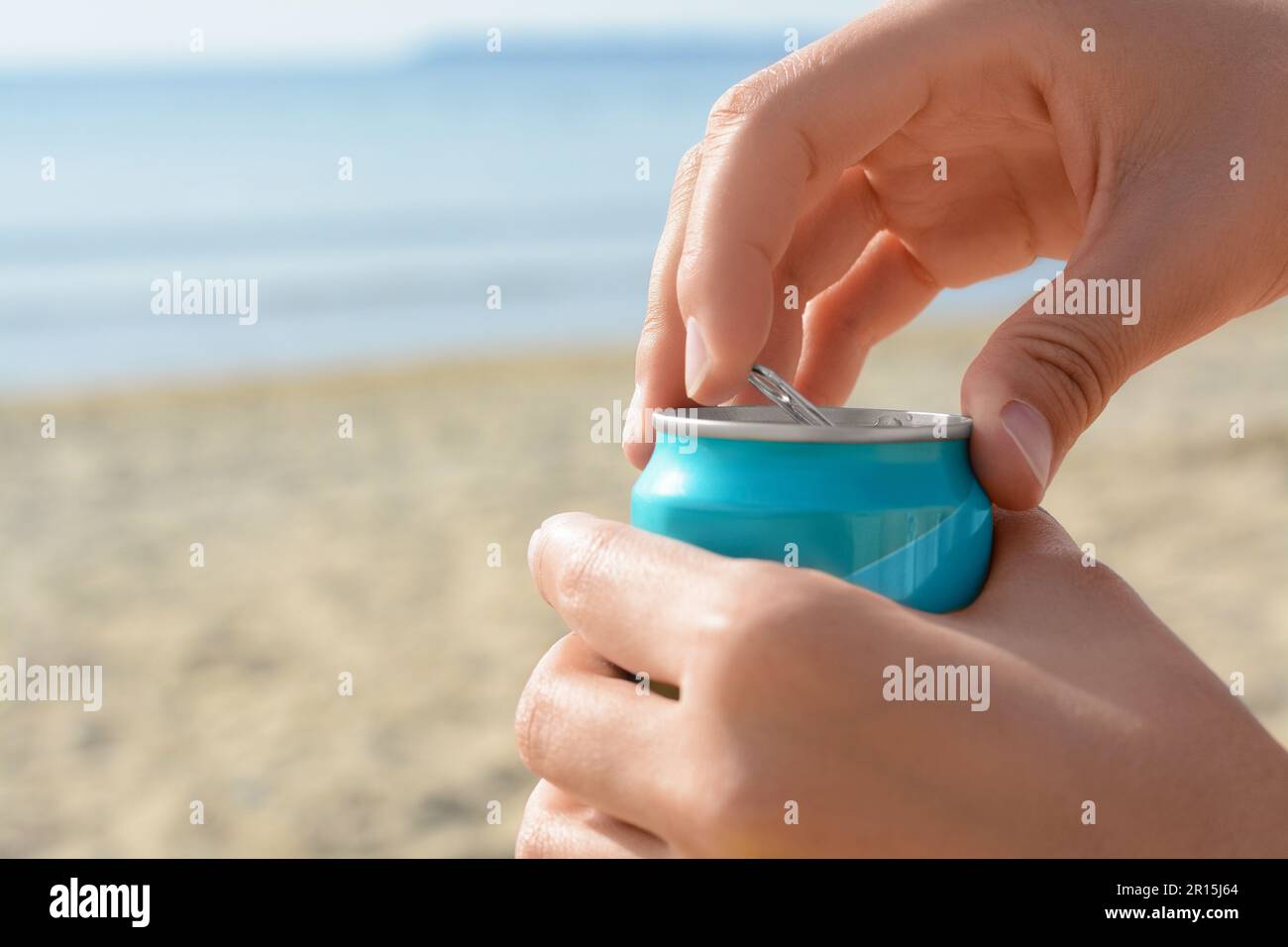 Hands opening can soda closeup hi-res stock photography and images - Alamy
