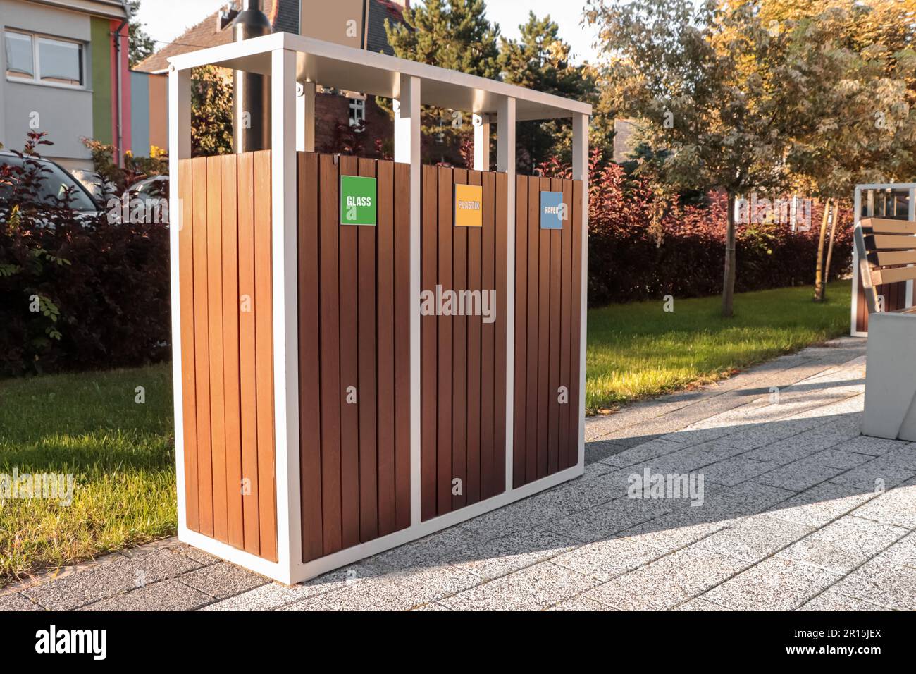 Different sorting bins for waste recycling on sunny day outdoors Stock ...