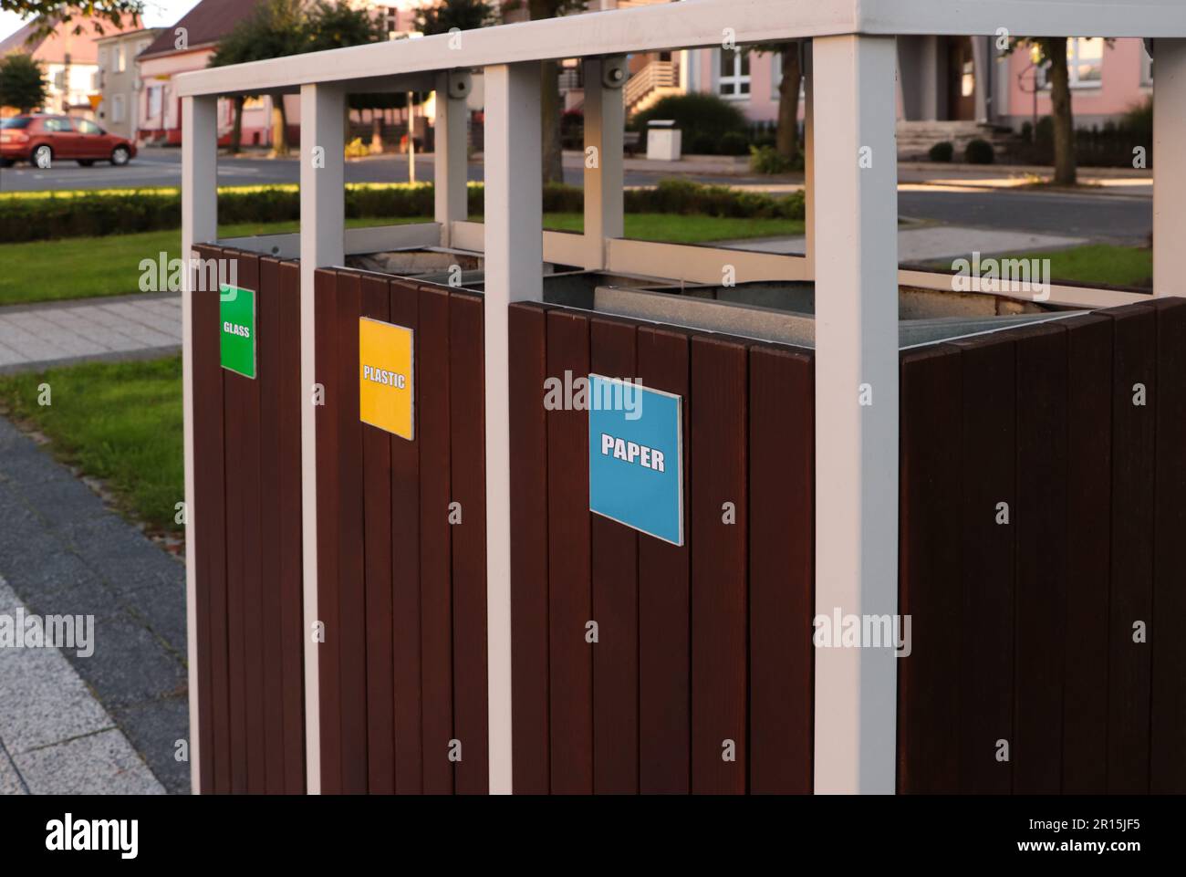 Different sorting bins for waste recycling outdoors, closeup Stock ...