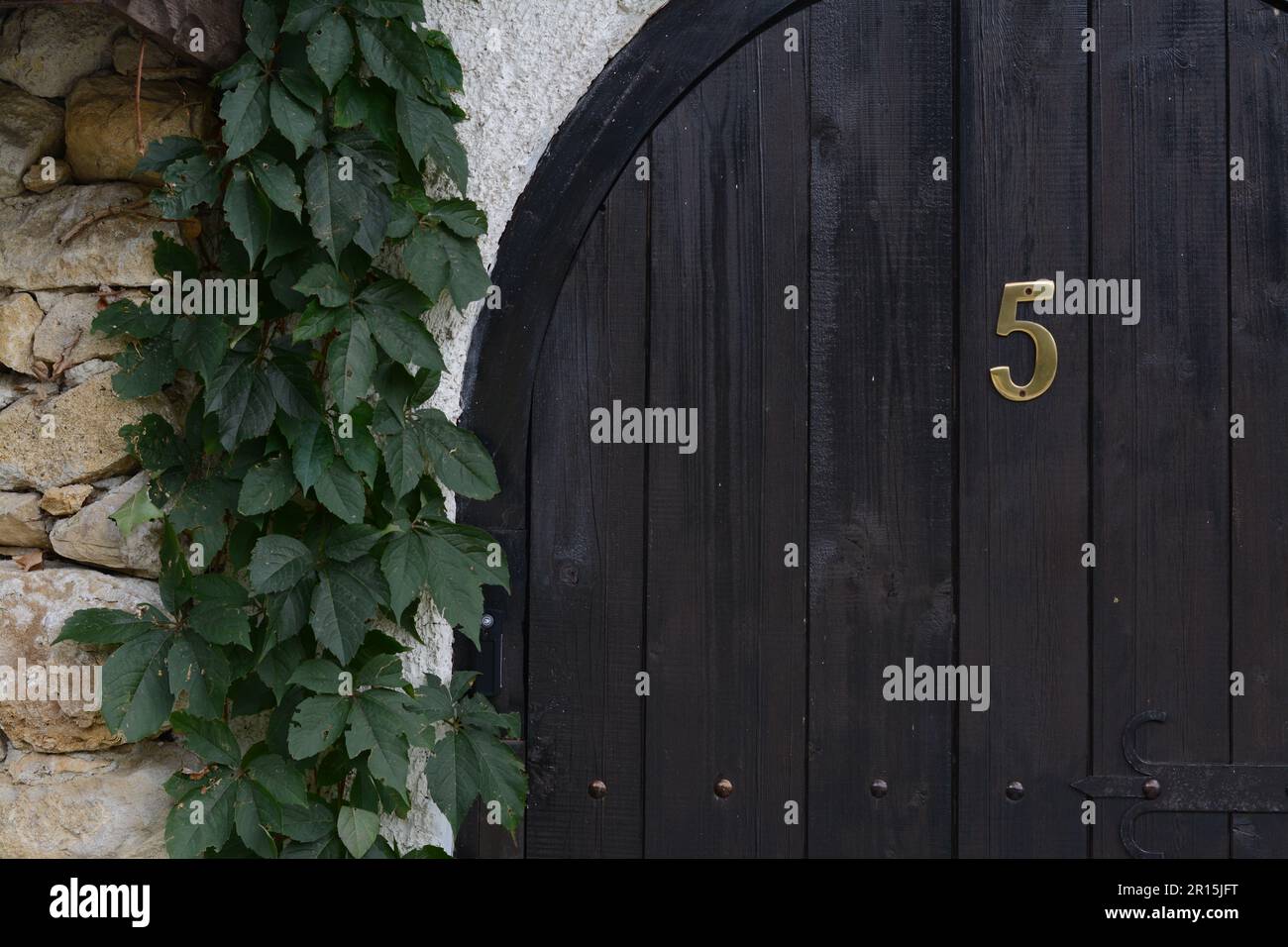 House number five on wooden door outdoors Stock Photo - Alamy
