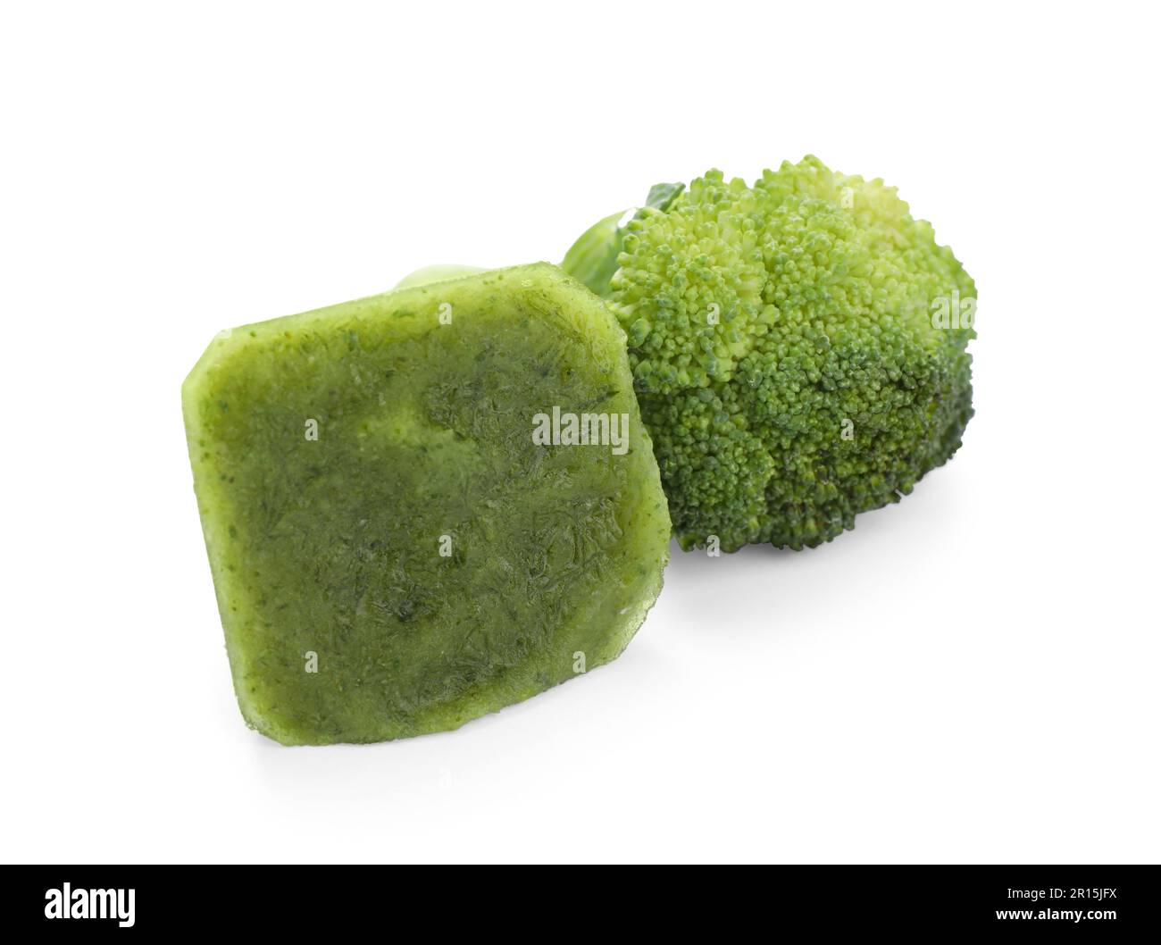 Frozen broccoli puree cube and fresh broccoli isolated on white Stock ...