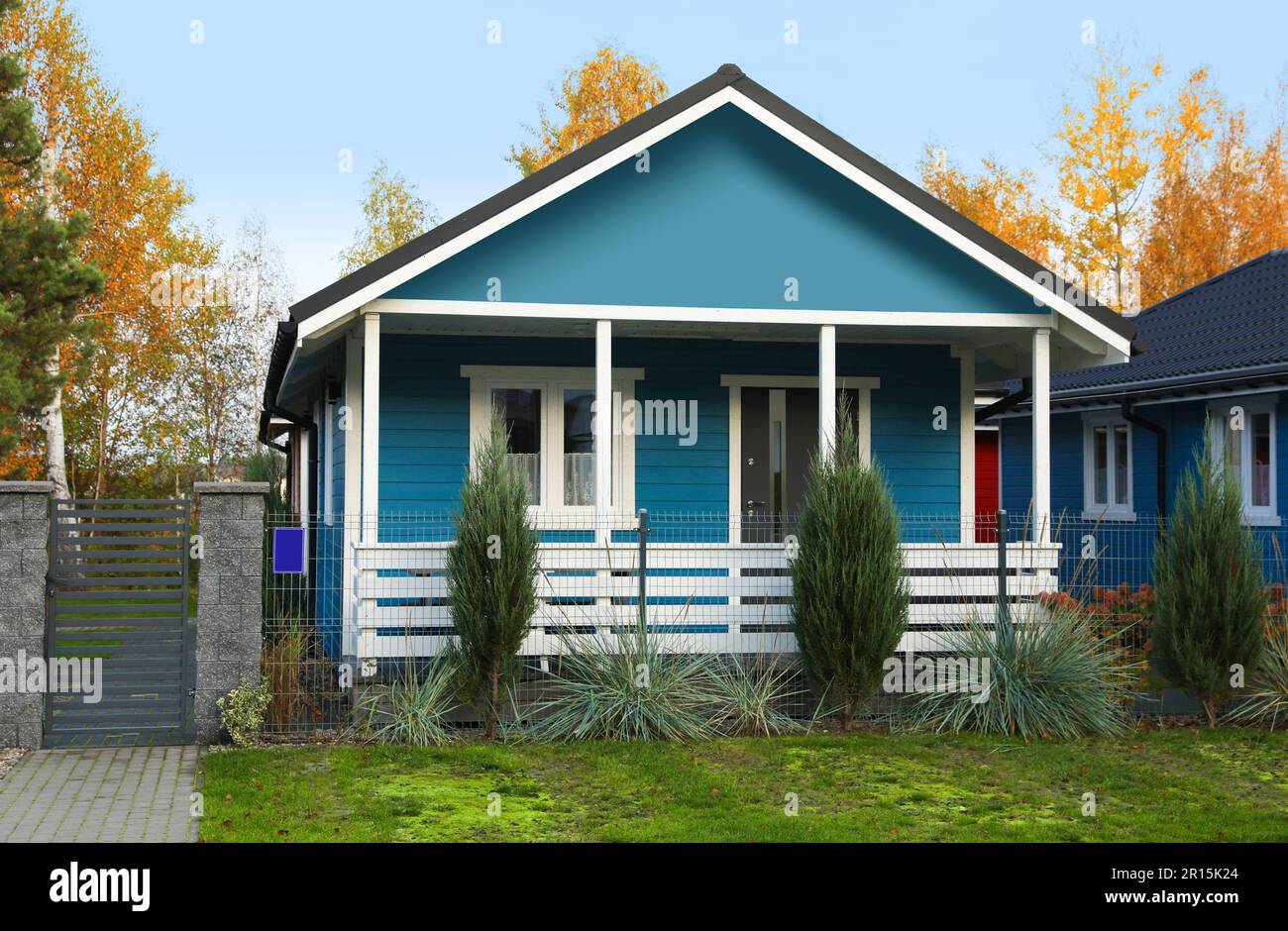 Beautiful light blue houses outdoors. Real estate Stock Photo - Alamy
