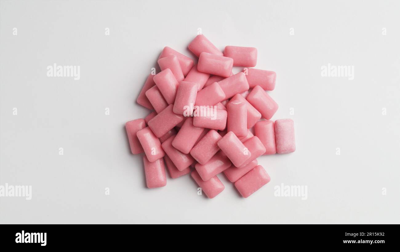 Sweet chewing gums on white background, top view Stock Photo - Alamy