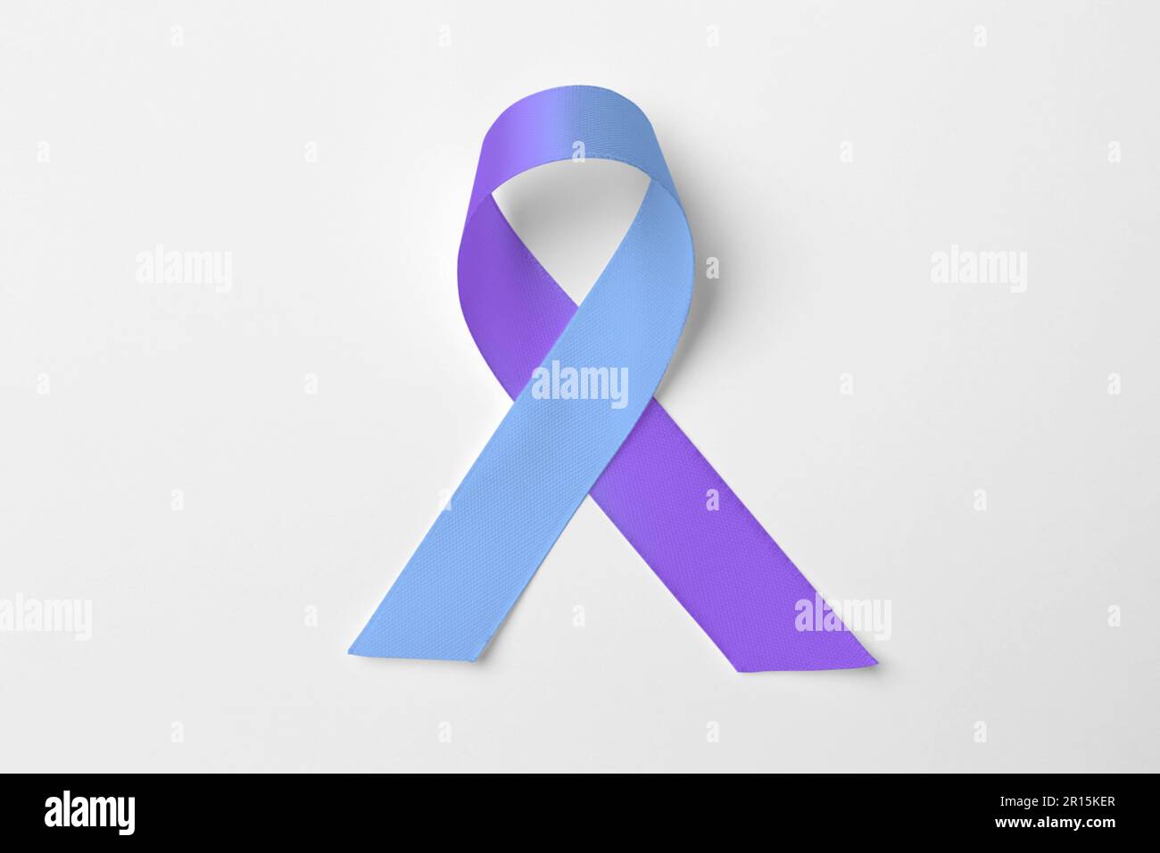 World Arthritis Day. Blue and purple awareness ribbon on white ...