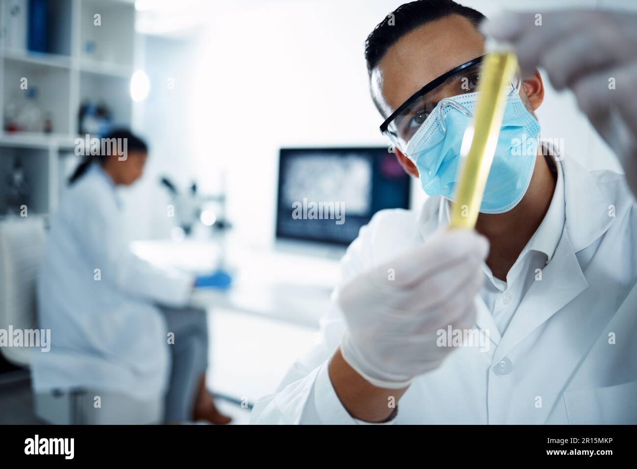 Youre almost ready to be approved. a young scientist conducting medical research in a laboratory ...