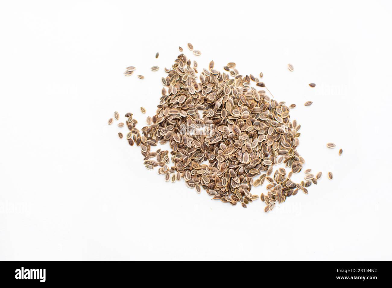 Dill seeds isolated on the white background Stock Photo - Alamy