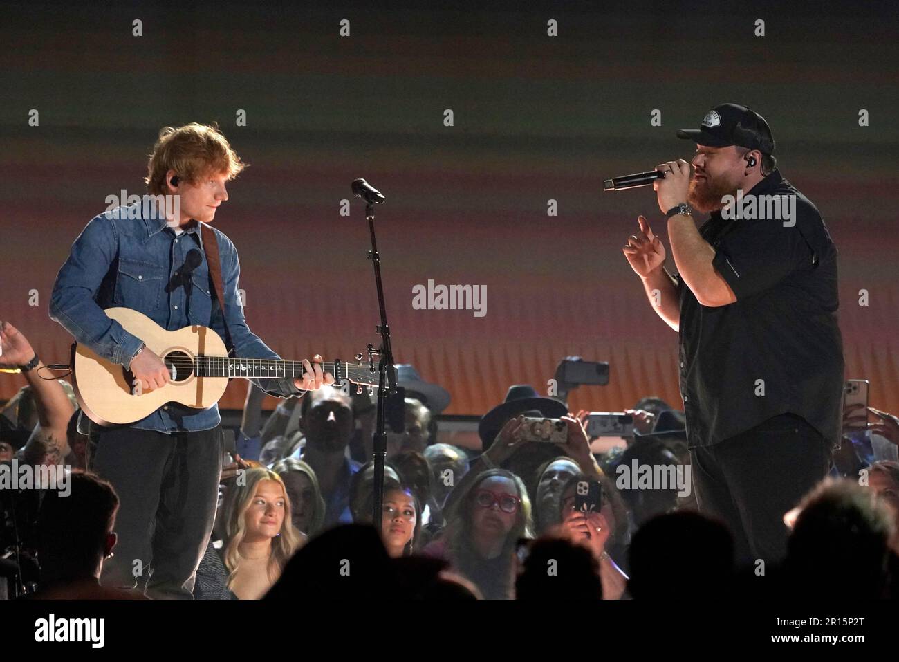 Ed Sheeran, left, and Luke Combs perform "Life Goes On" at the 58th ...