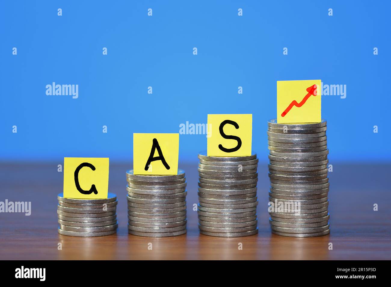 A row of a growing stack of coins illustrating the increasing cost of ...