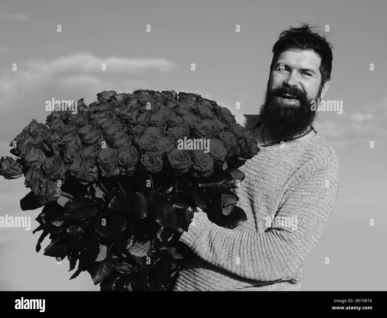 Man large bouquet roses Black and White Stock Photos & Images - Alamy