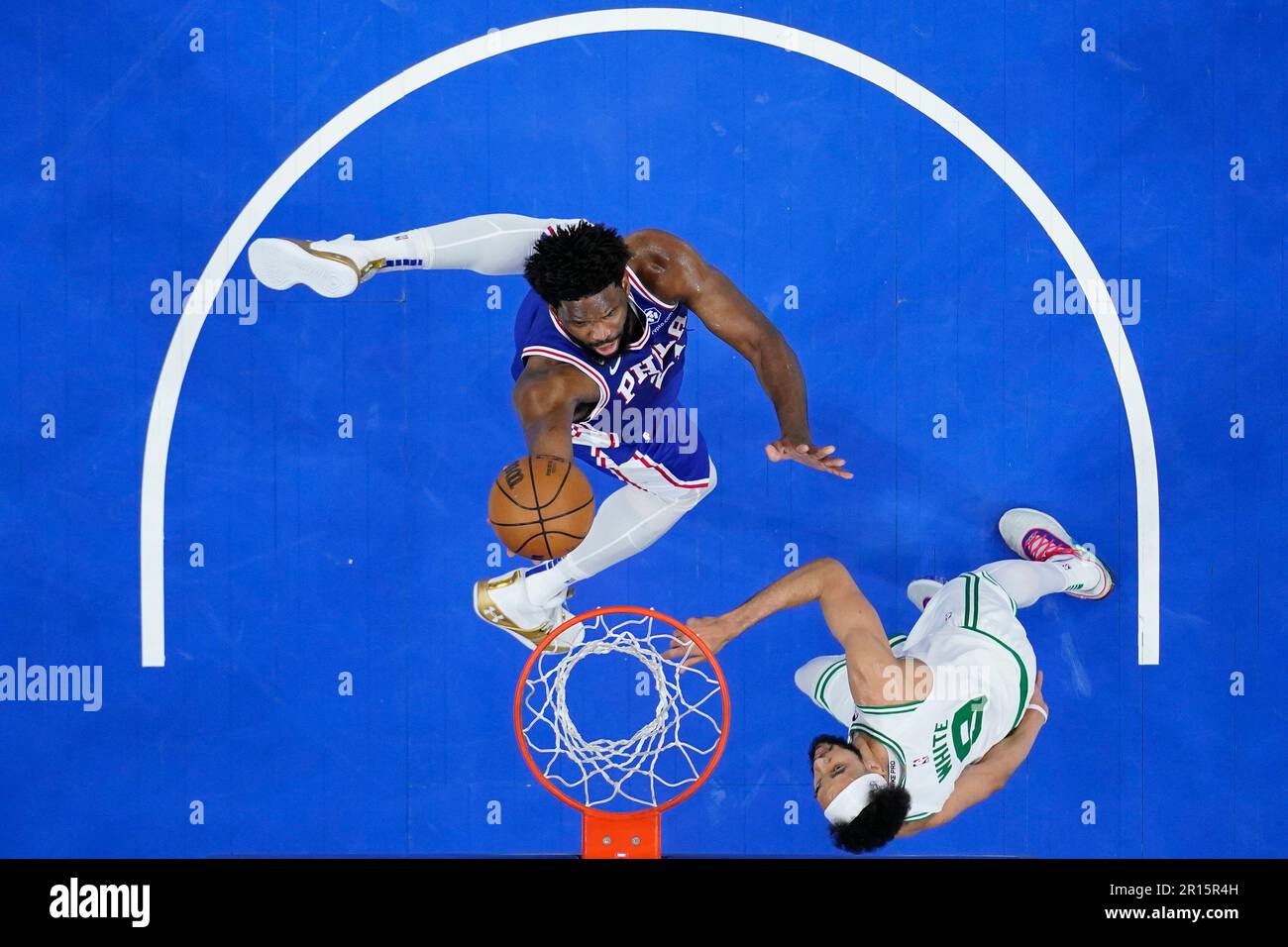 Philadelphia 76ers' Joel Embiid goes up for a shot against Boston ...