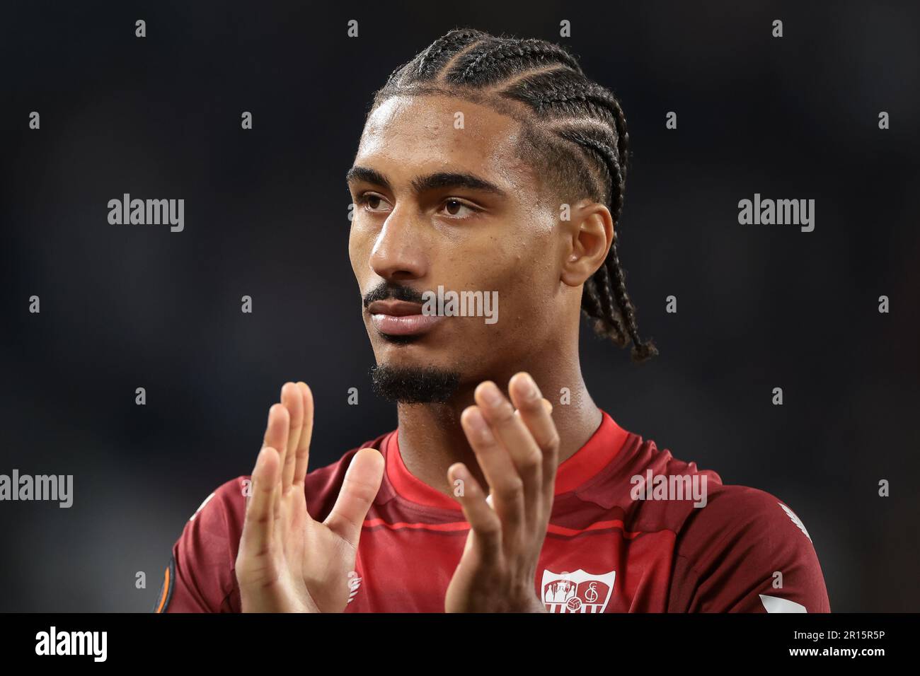 Turin, Italy. 11th May, 2023. Loic Bade of Sevilla applauds the fans ...