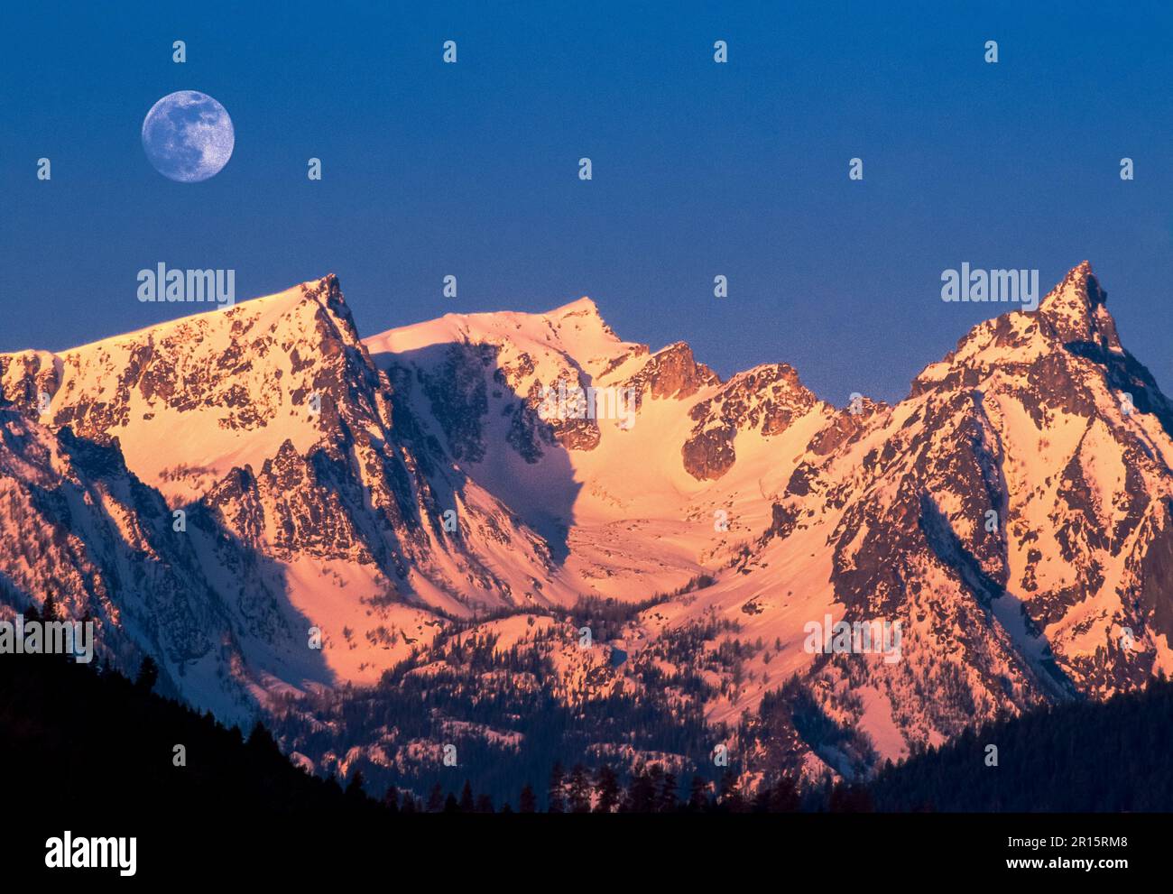 moon over trapper peak in the bitterroot mountains near conner, montana ...