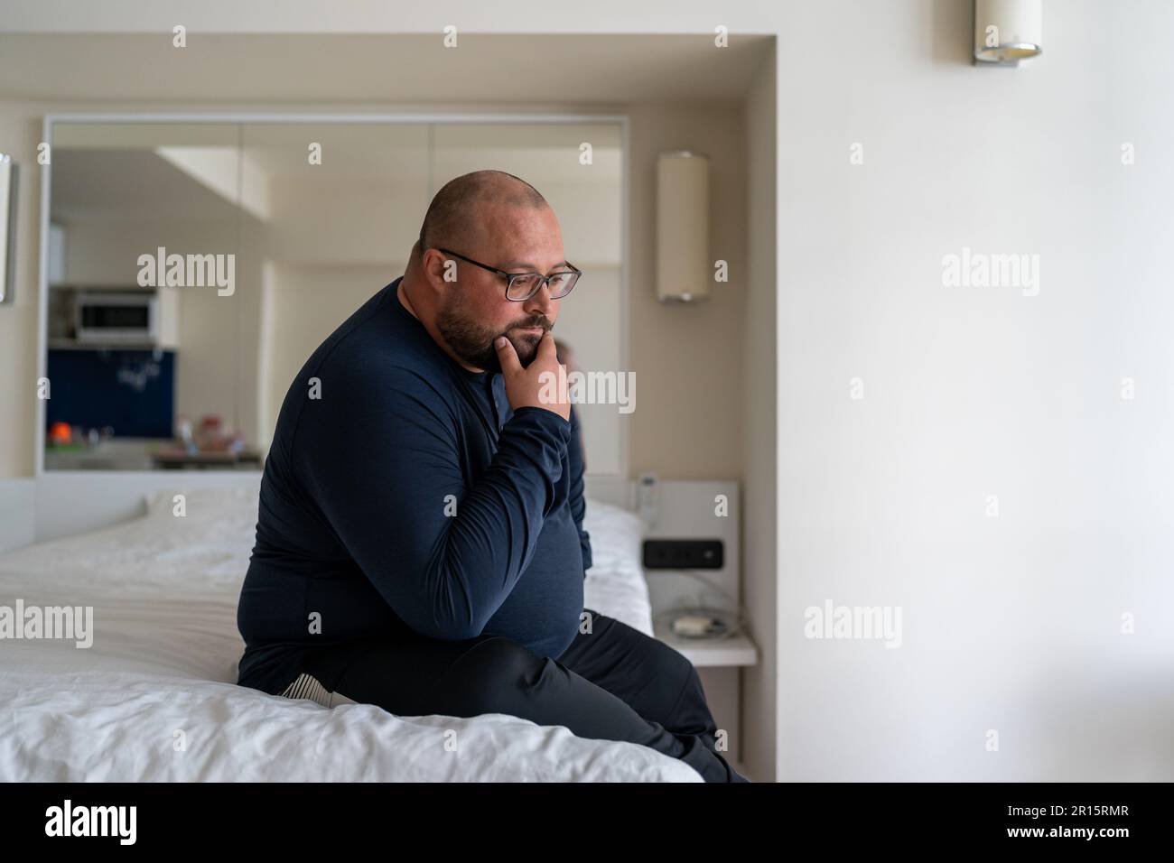 Sad lonely overweight fat young hi-res stock photography and images - Alamy