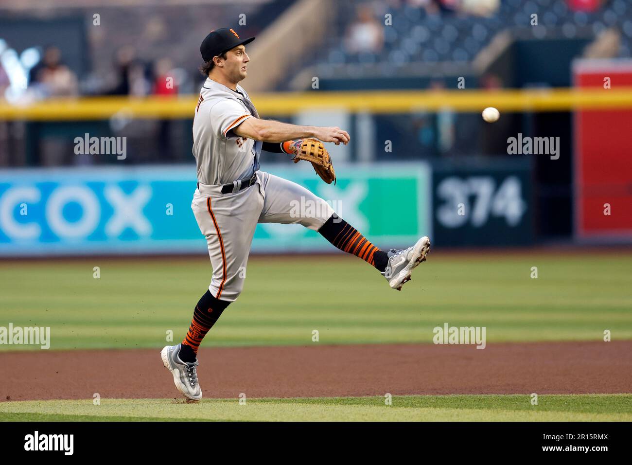 San Francisco Giants shortstop Casey Schmitt throws to first base for ...