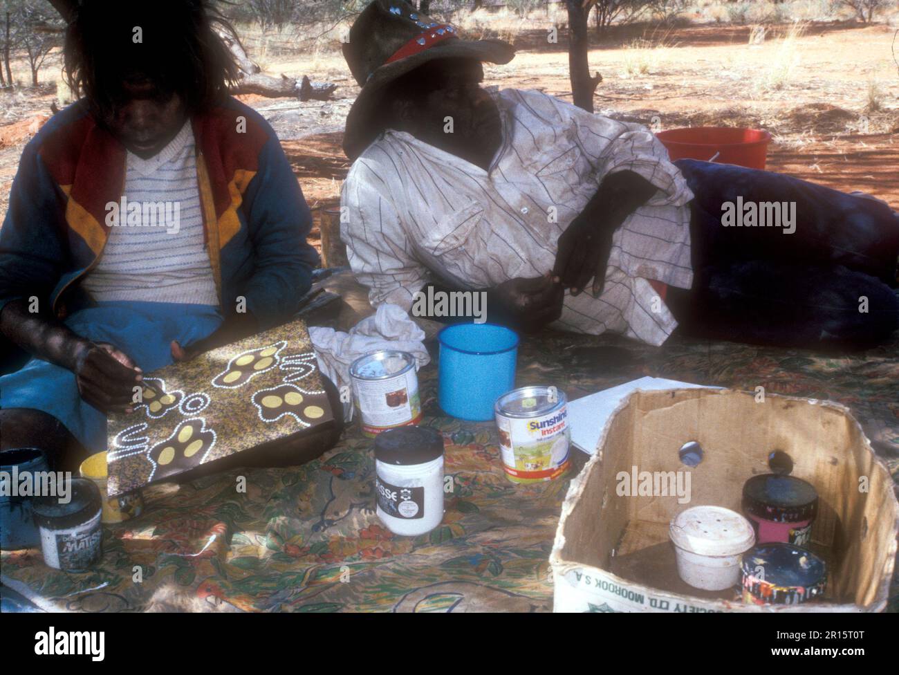 Aboriginal artists in a bush camp Outback Australia Stock Photo - Alamy