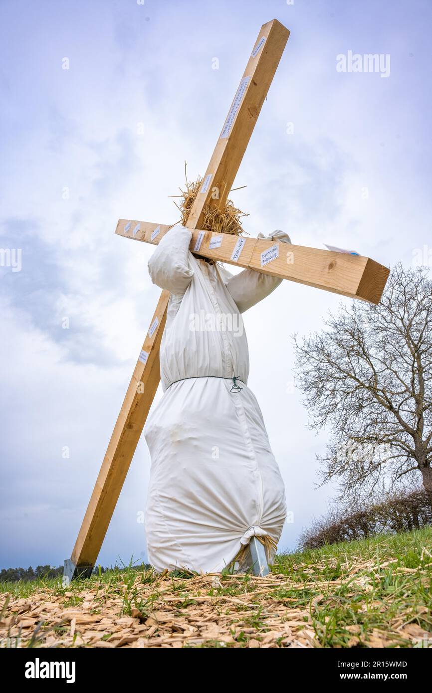 Doll carrying cross on Easter path, Gechingen, Black Forest, Germany ...
