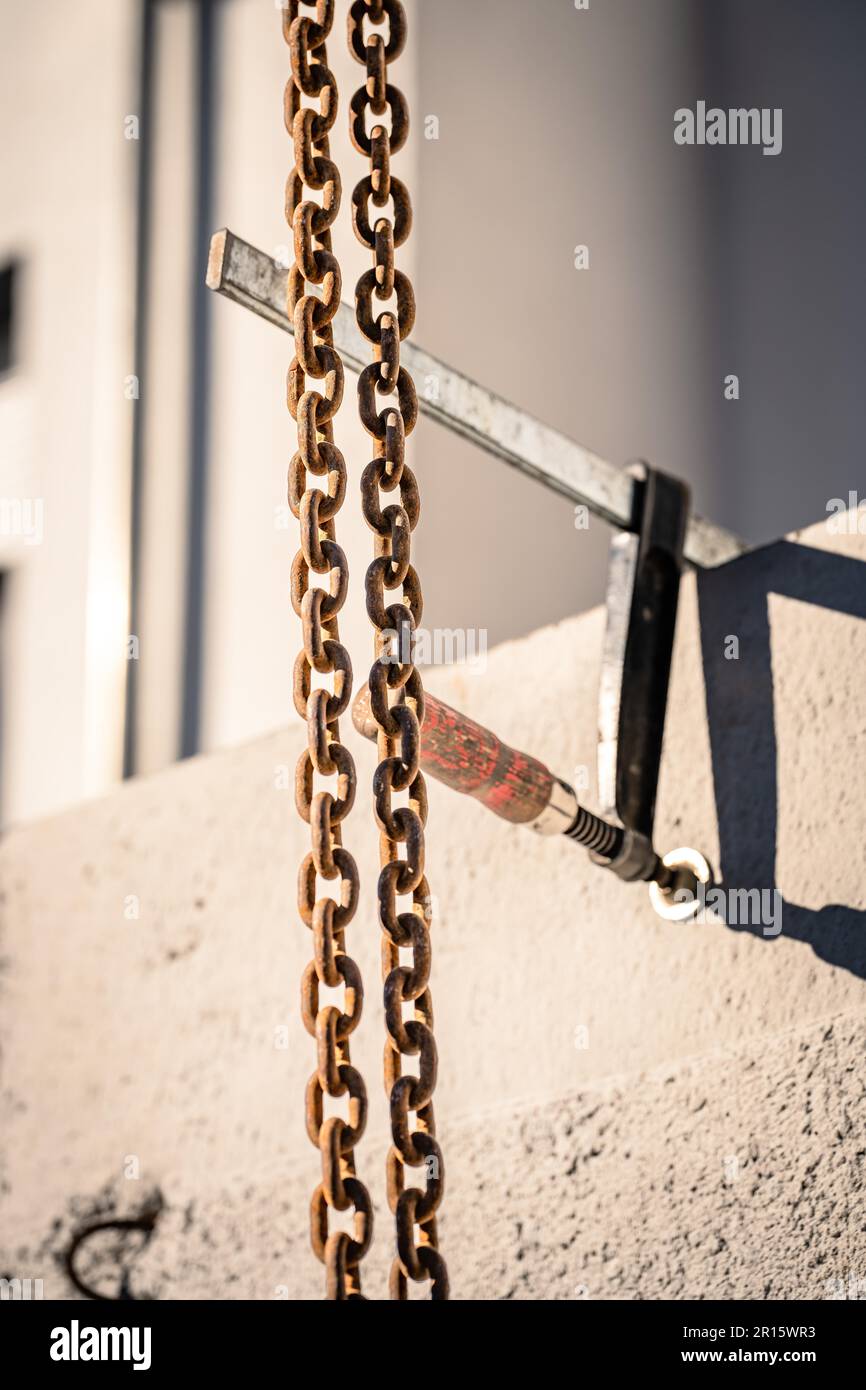 Chain on construction site, Calw, Germany Stock Photo - Alamy