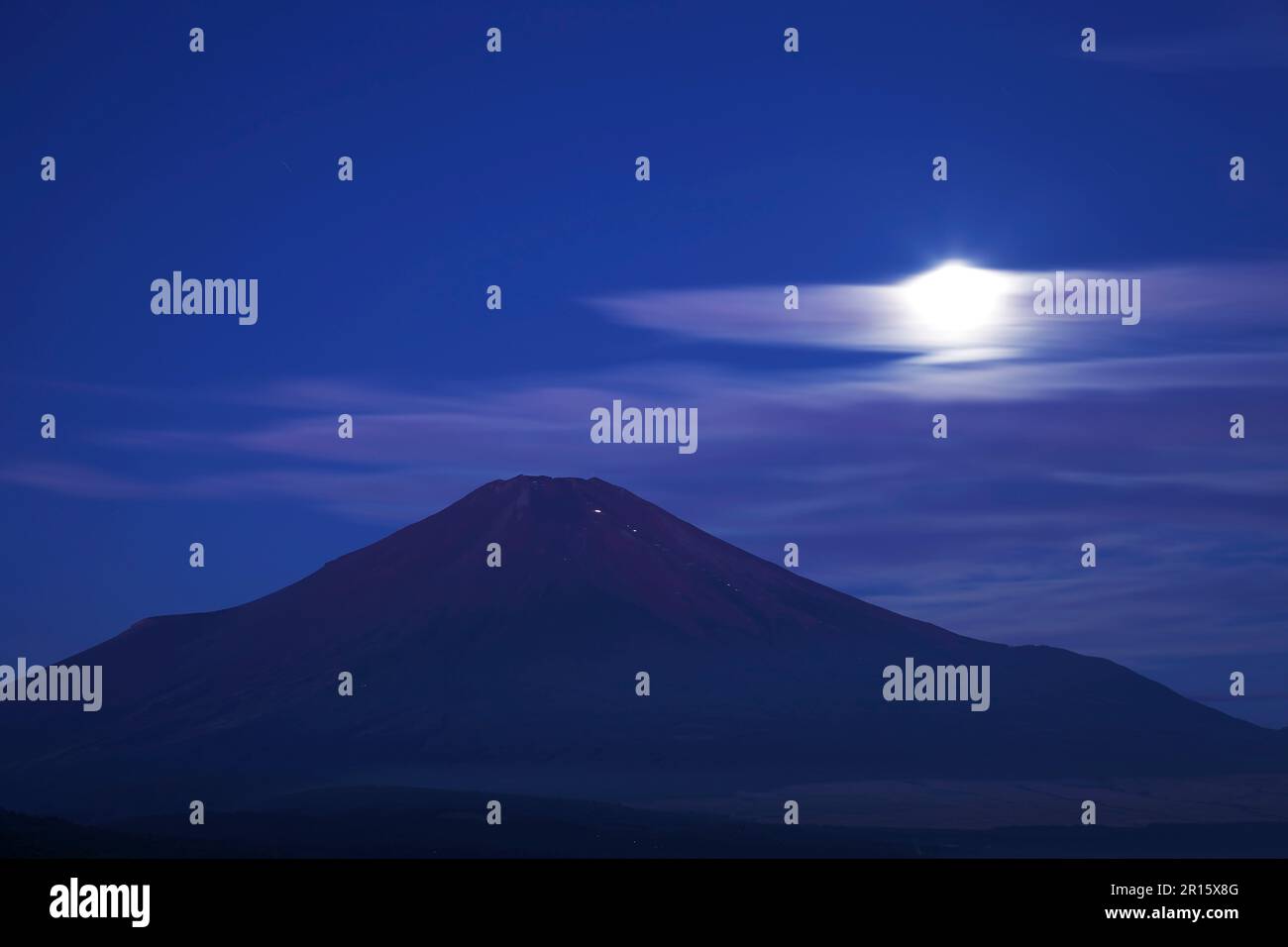 Mt. Fuji and the moon of dawn Stock Photo - Alamy