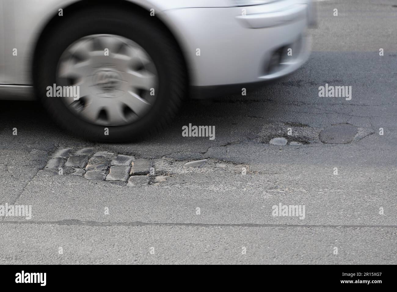Car bad road surface hi-res stock photography and images - Alamy