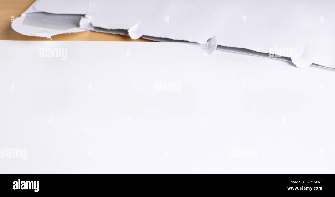 blank letter and opened envelope on desk Stock Photo - Alamy