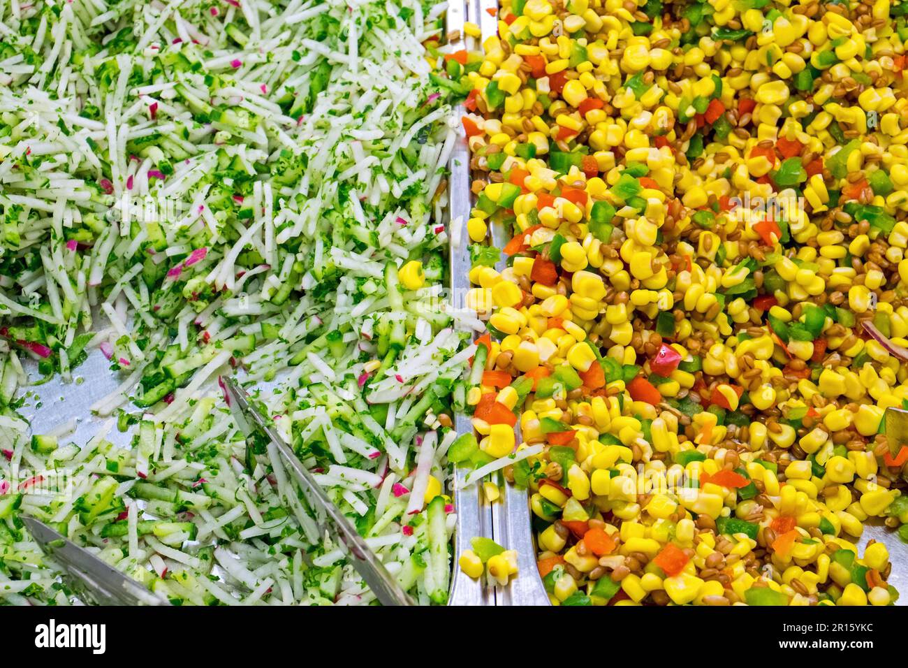 Corn and cucumber salad on a buffet Stock Photo - Alamy