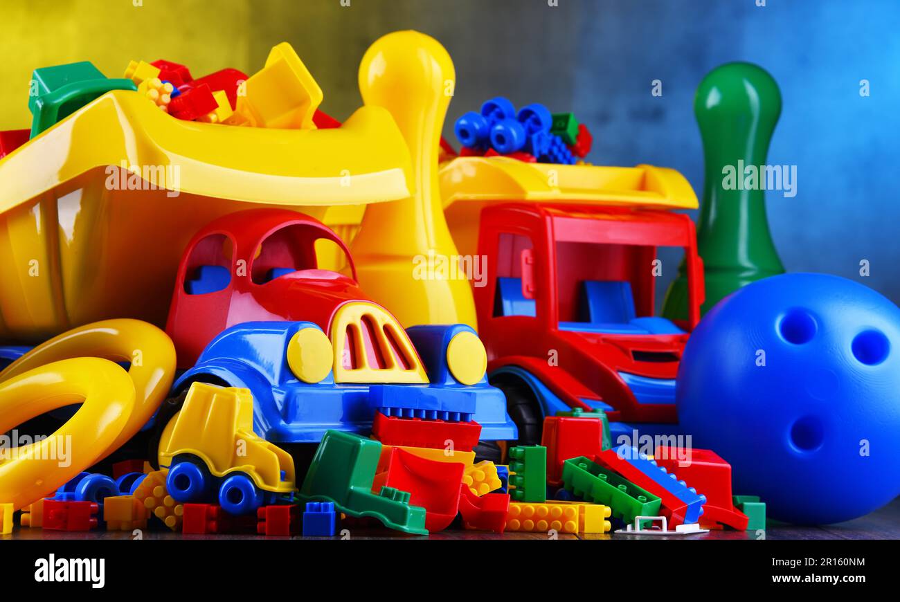 Composition with colorful plastic children toys Stock Photo - Alamy