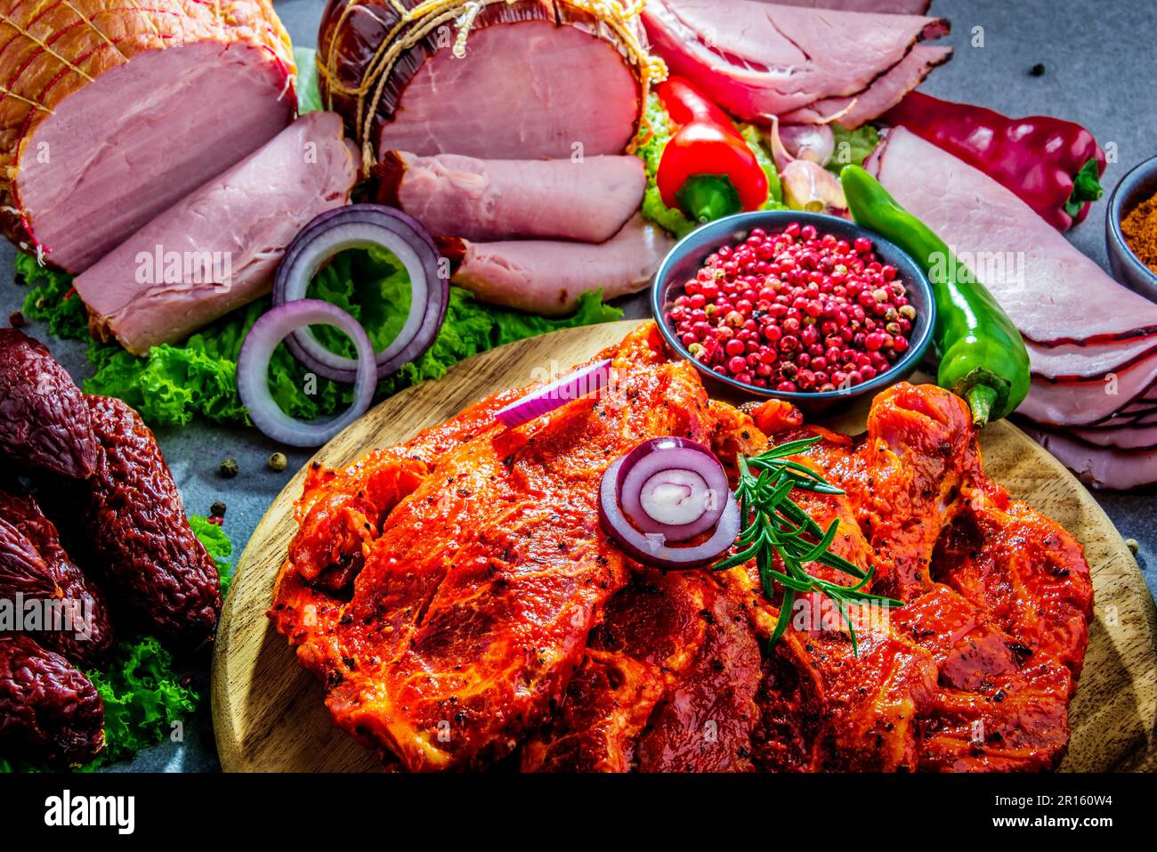 Composition with assorted meat products including ham, sausage and ...