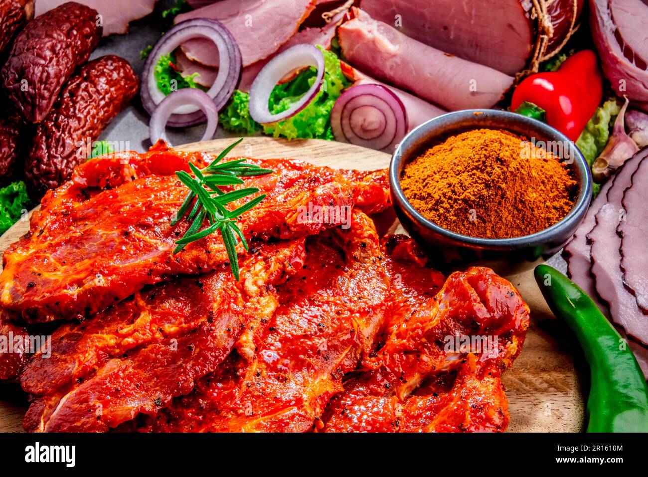 Composition with assorted meat products including ham, sausage and ...