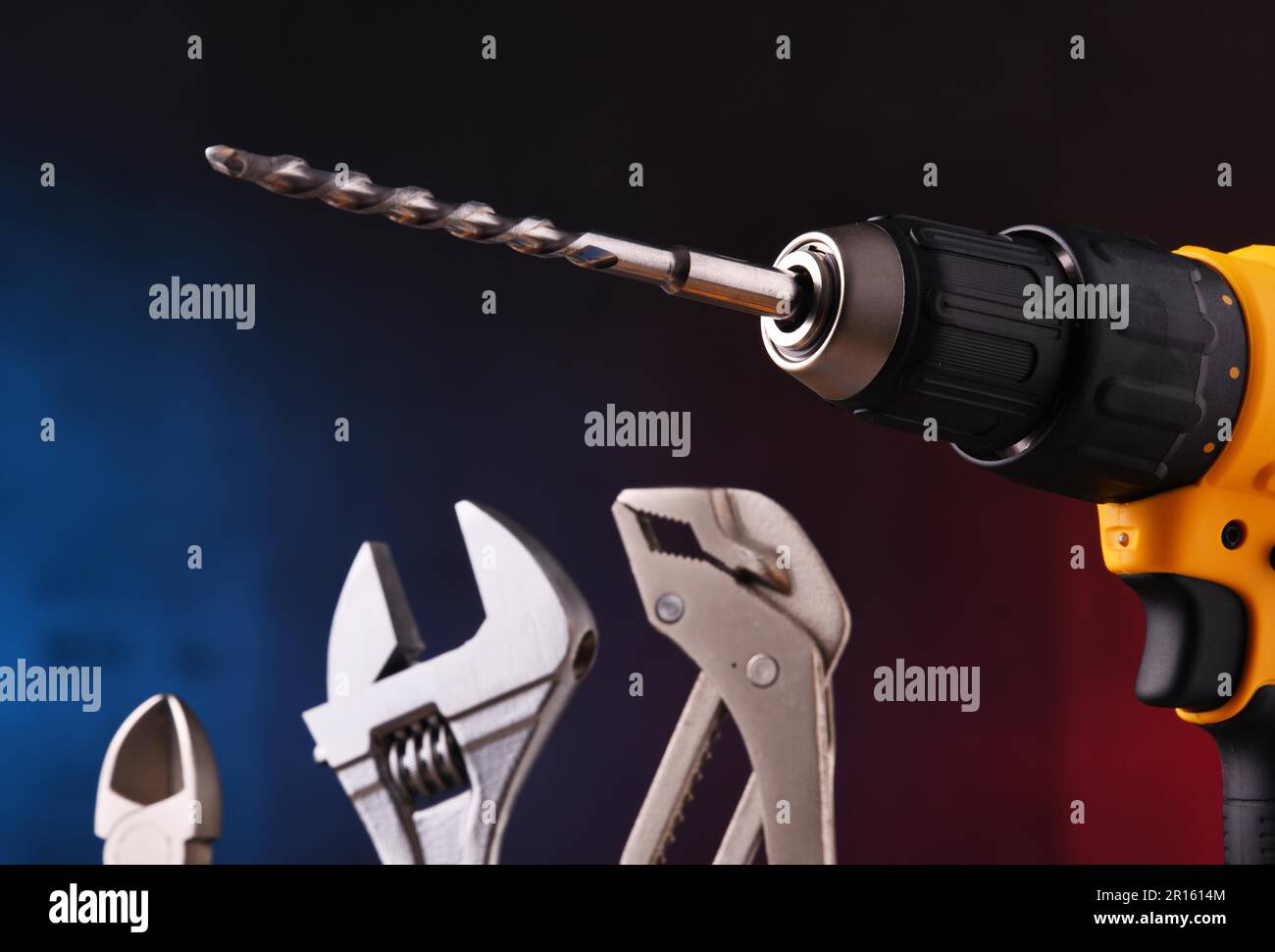 Composition with hardware tools including cordless drill and monkey ...