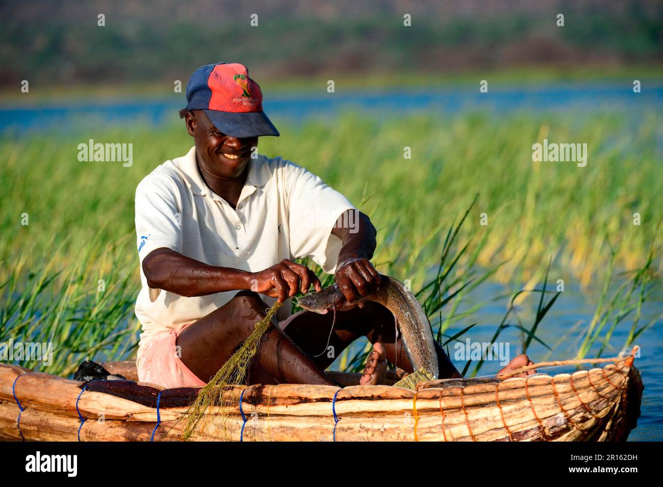 Fisherman catching fish on Baringo lake, Kenya, Africa Stock Photo - Alamy