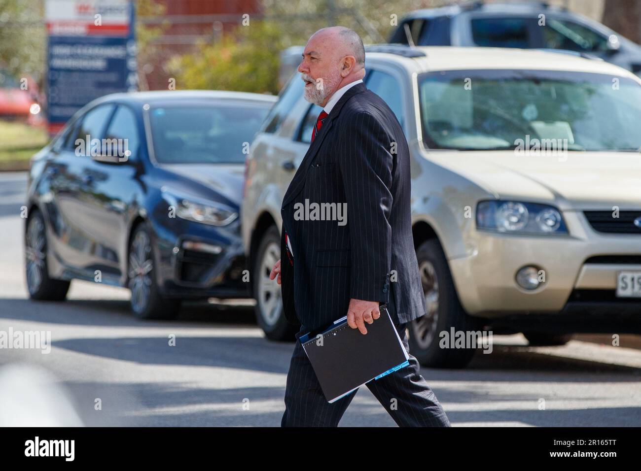 Prosecutor Jim Pearce KC during a tour of a crime scene in Pooraka, SA ...