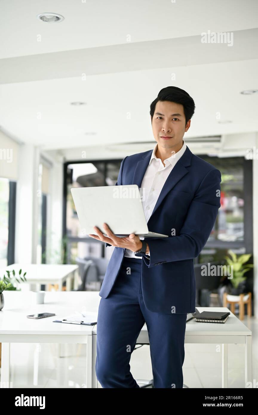 Successful and professional millennial Asian businessman or male CEO in ...