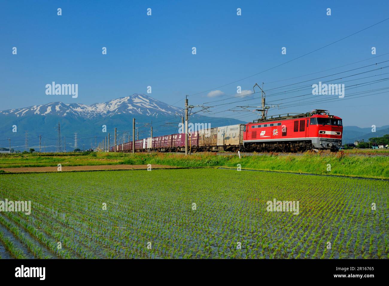 Mount Chokai and a freight train Stock Photo - Alamy