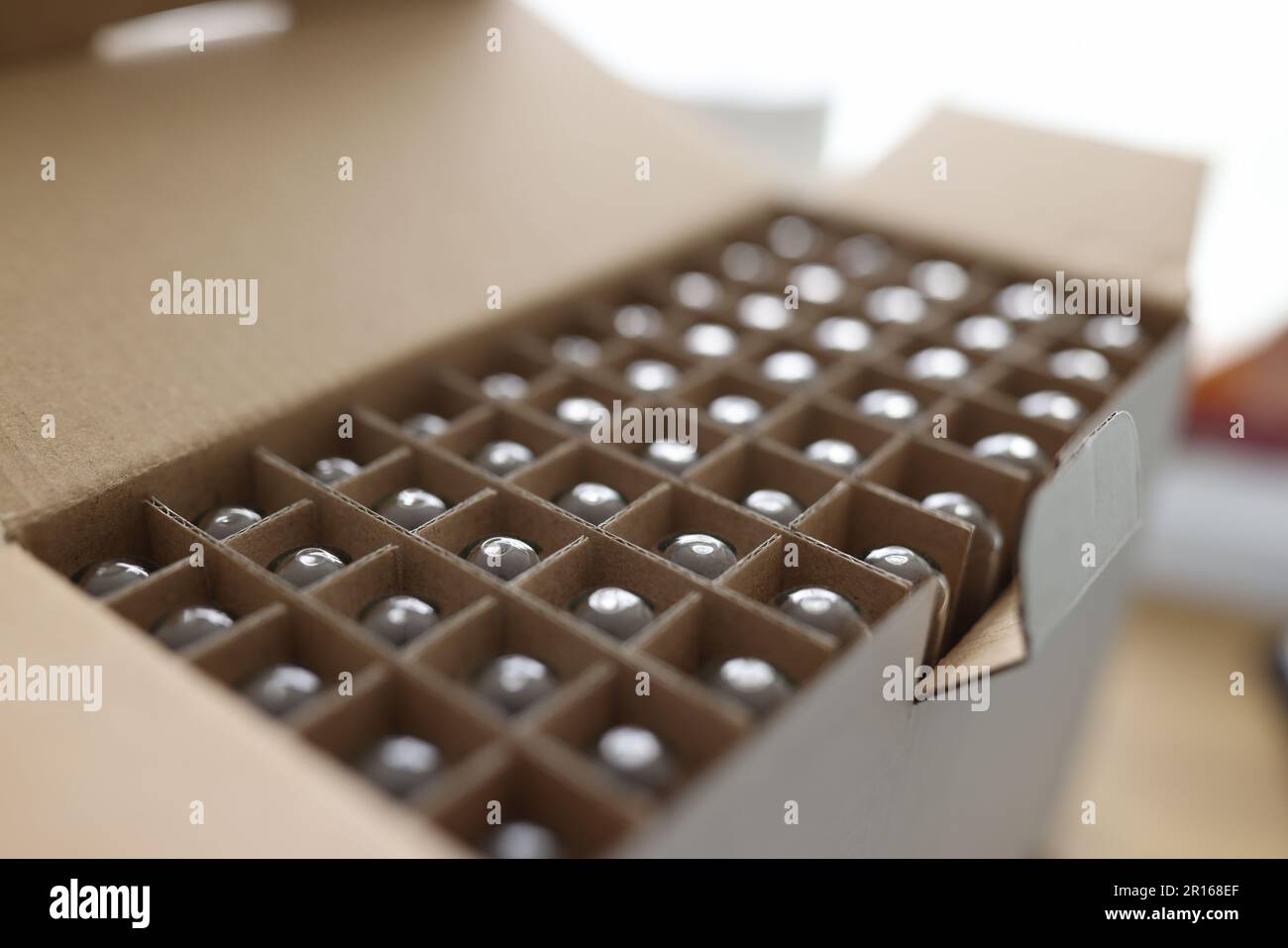 Open cardboard box with test tubes in scientific laboratory Stock Photo ...
