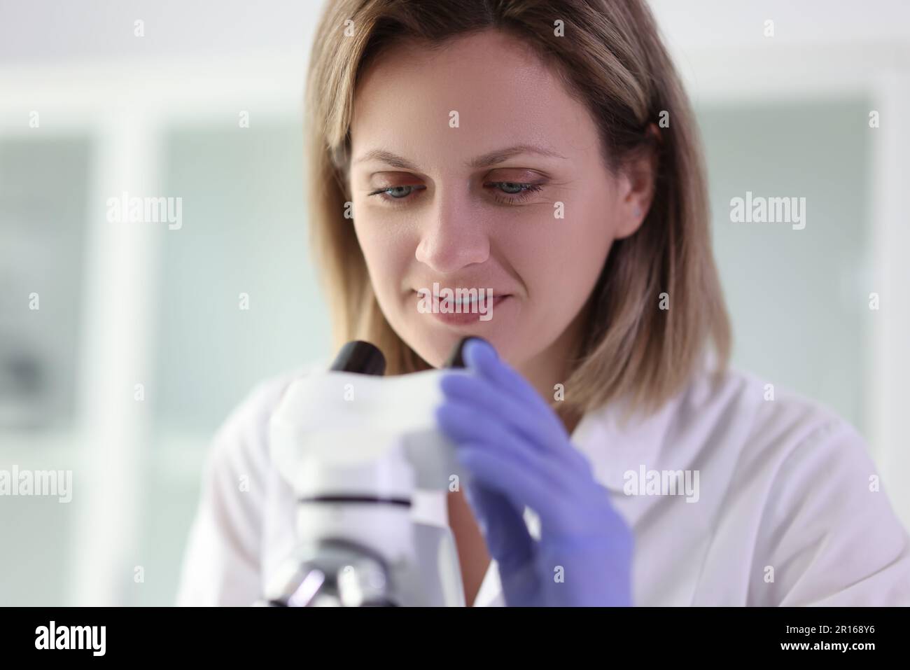 Smiling scientist looks in hi-res stock photography and images - Alamy