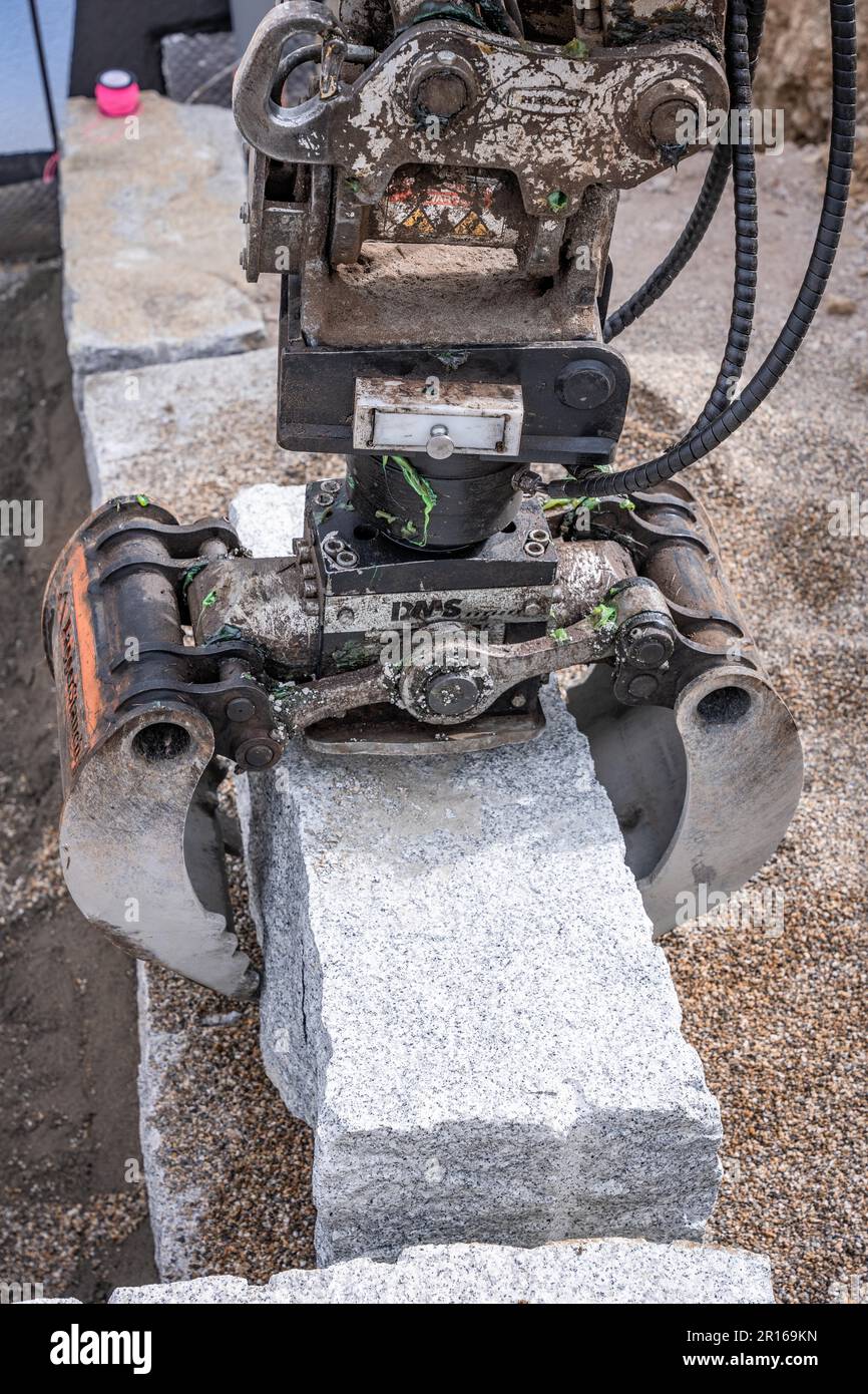 Excavator grab with stone on construction site, Calw, Germany Stock ...