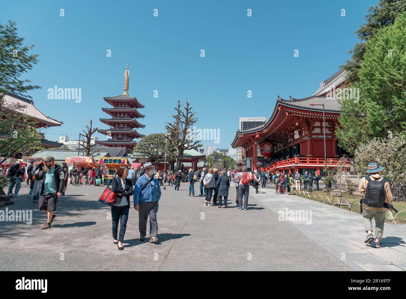 TOKYO, JAPAN - APRIL 9, 2023: People walking in Senso-ji temple in ...
