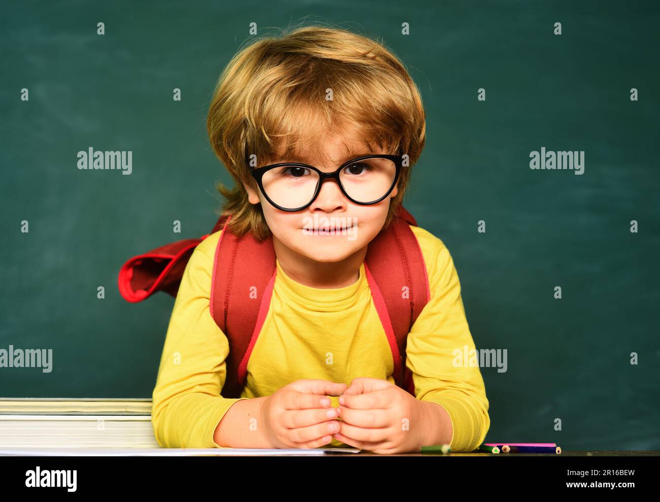 Cute little preschool kid boy in a classroom. Science education concept ...