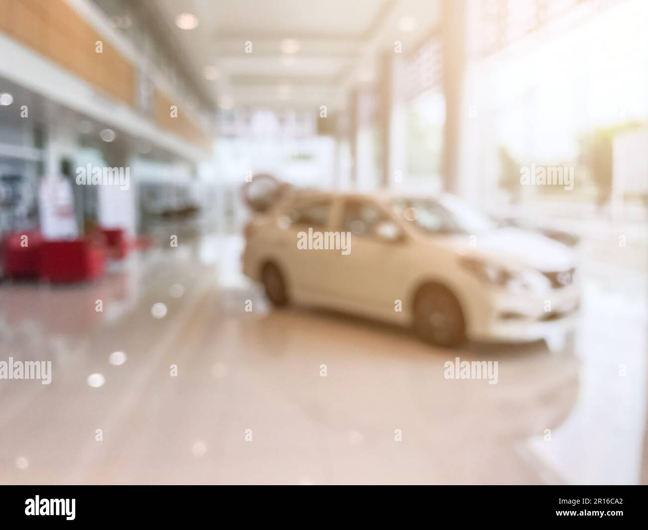 Blur image of car in the showroom use for background Stock Photo - Alamy