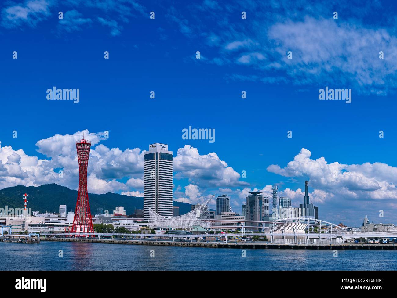 Summer clouds hovering over Kobe port and Meriken park Stock Photo - Alamy