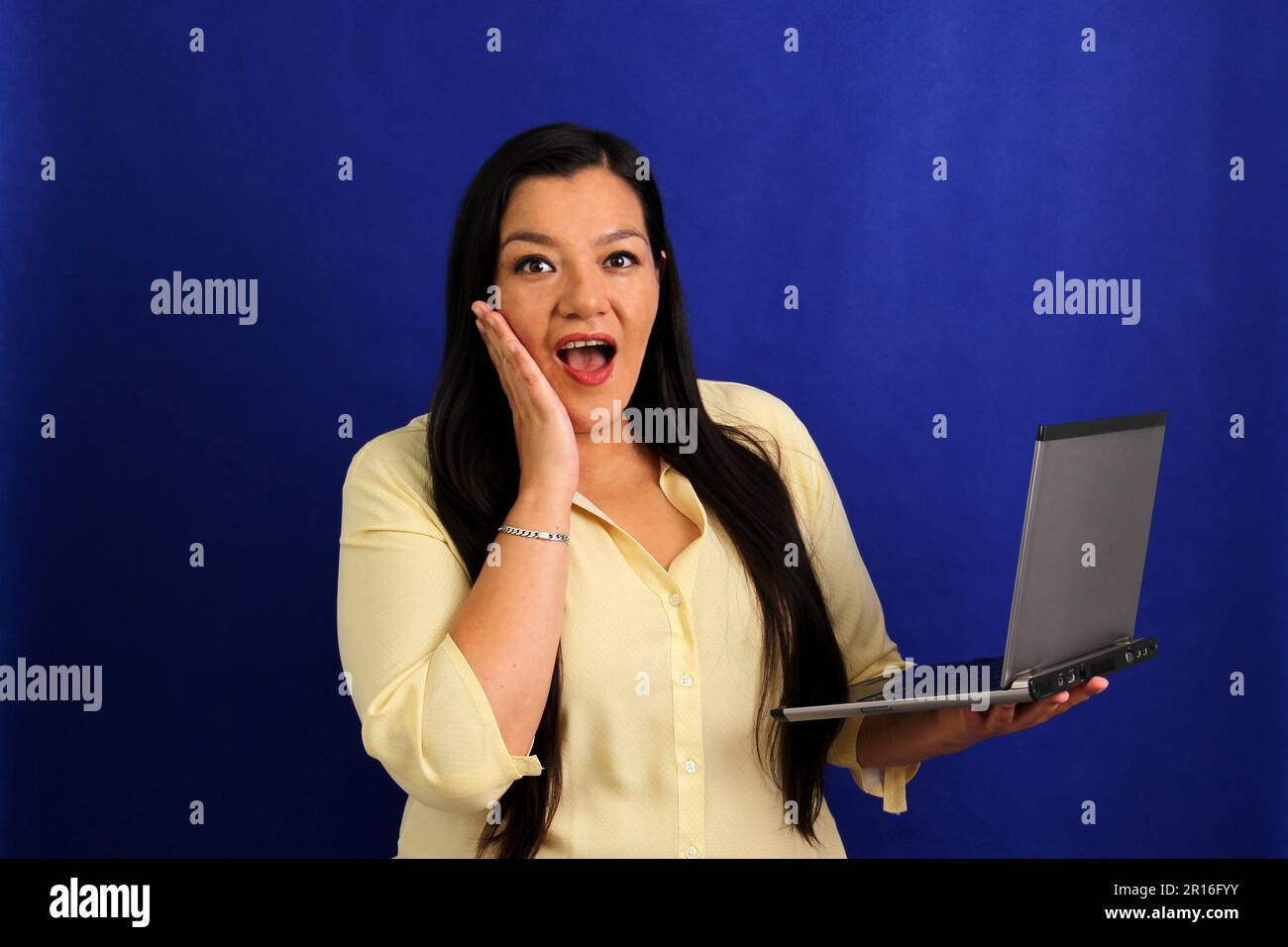 Excited hispanic freelancer in hi-res stock photography and images - Alamy
