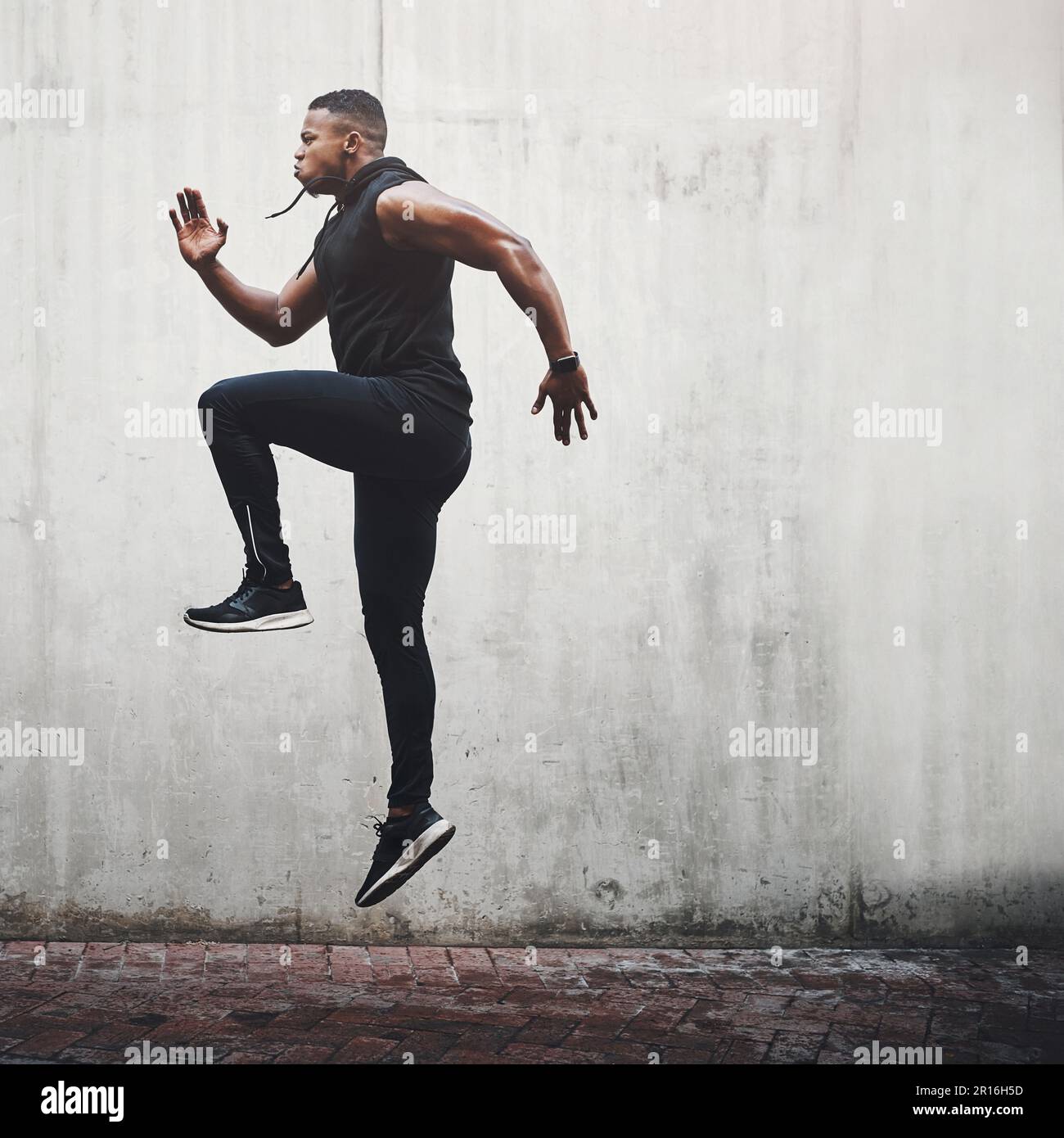 Jump, fitness and black man running, speed and energy for cardio ...