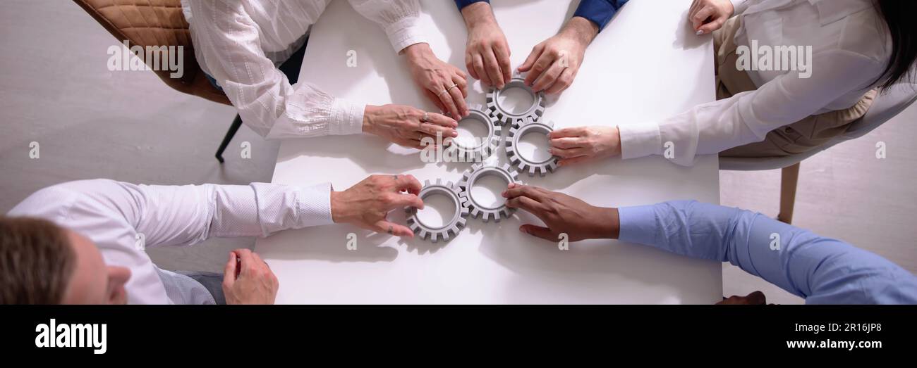 Diverse People Hands Holding Gear Wheels. Business Partnership Stock ...