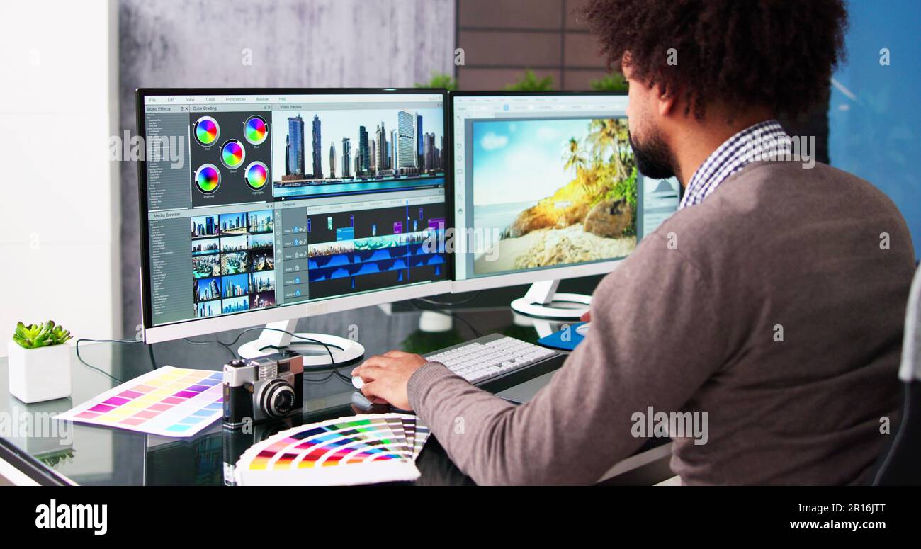 African American Video Editor Tech Job Using Computer Stock Photo - Alamy